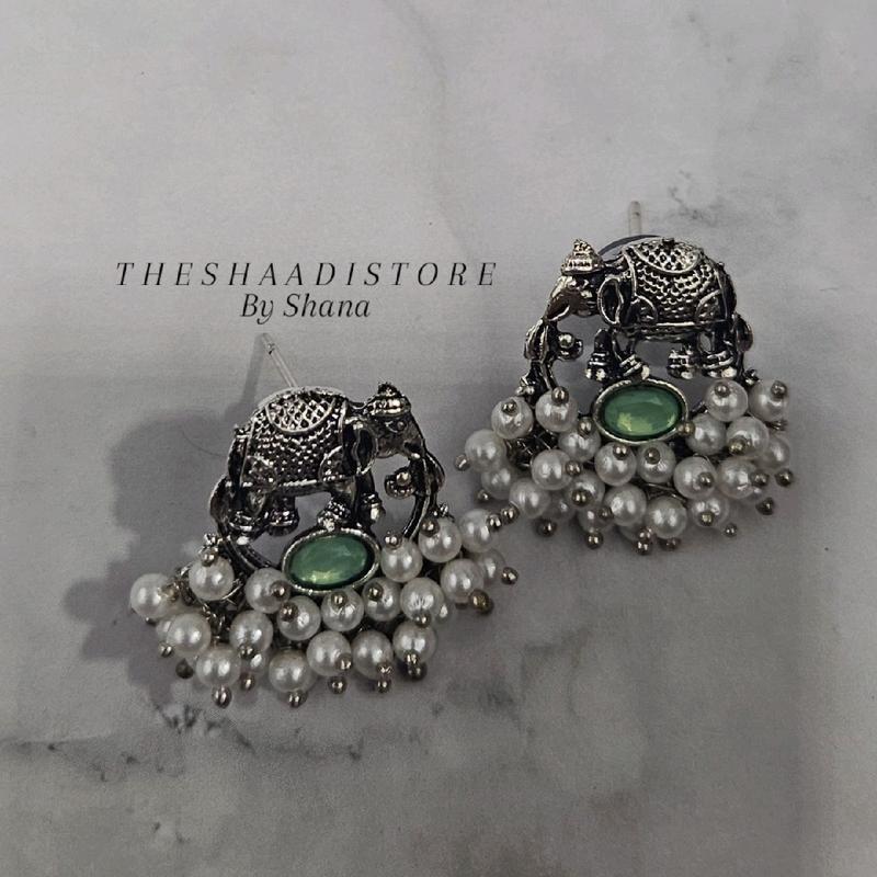 Elephant pearl german silver ear studs - TikTok Shop Singapore