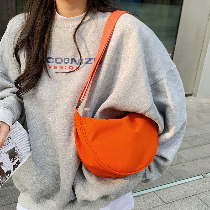 Colorful fashionable canvas dumpling shaped shoulder bag men - TikTok ...