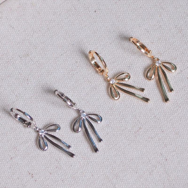 [forthco] Marianne Droopy Bow Huggies, 24k gold-plated / white - TikTok ...
